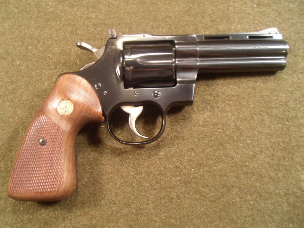 Colt Python 4in 357 mag revolver - nice shooter grade - looking for trades